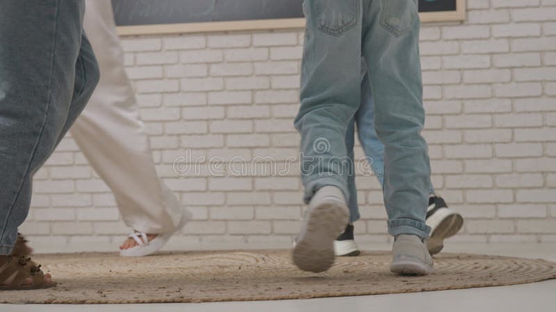 Young Teacher and Group of Children in Developmental Classes, Having ...