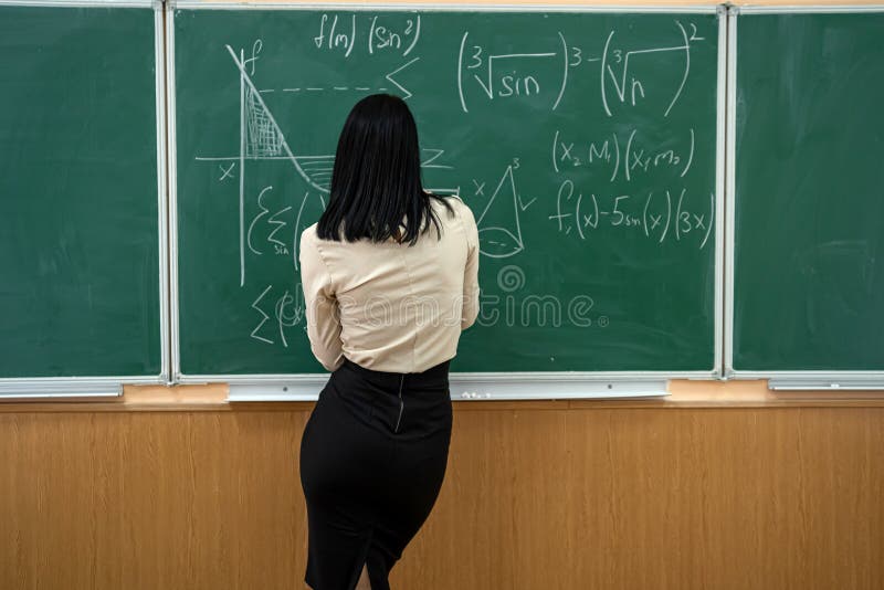 Young Teacher or Student Standing Near Blackboard and Learn Math Lesson ...