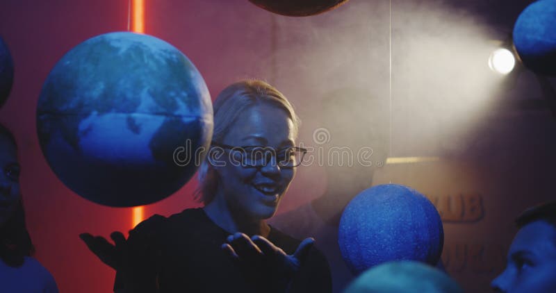 Young Teacher Teaching Astronomy with Planet Models Stock Photo - Image ...