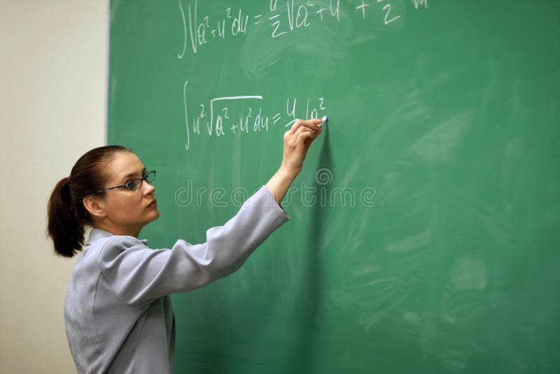 Young Teacher Writing On The Board Stock Image - Image of professor ...