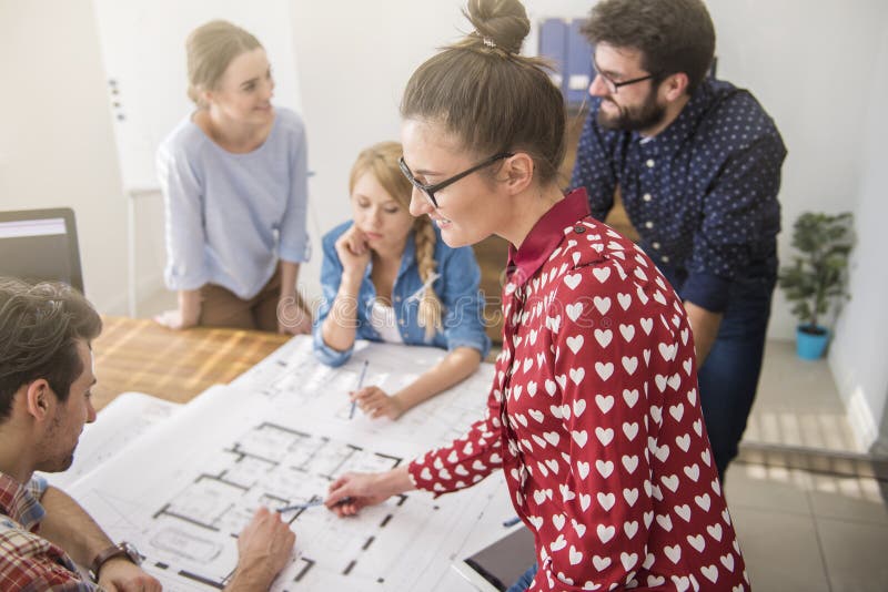Young team of architects stock photo. Image of communication - 58746548