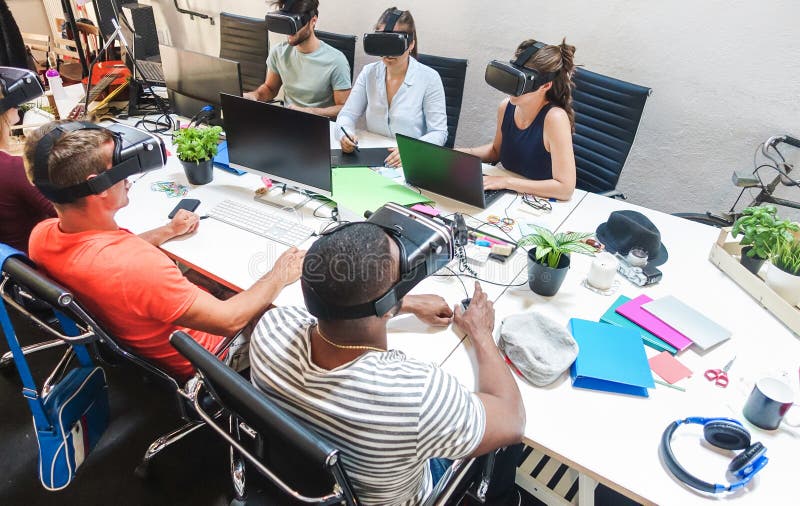 Young Teamwork Using Virtual Reality Glasses in Creative Office - Co ...