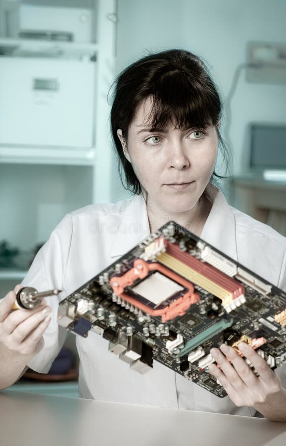 Young Man in Electronics Workshop Stock Photo - Image of young ...