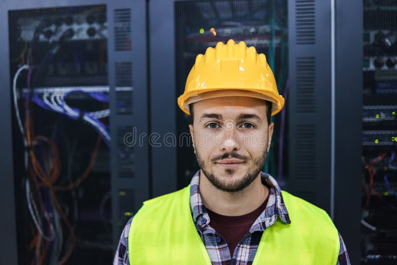 Young Technician Man Looking at Camera while Working Inside Big Data ...