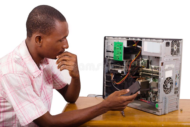 Young Technician Repairing a Computer Stock Photo - Image of device ...