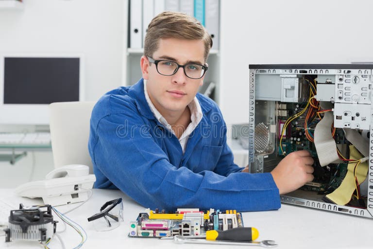 Young Technician Working on Broken Computer Stock Image - Image of desk ...