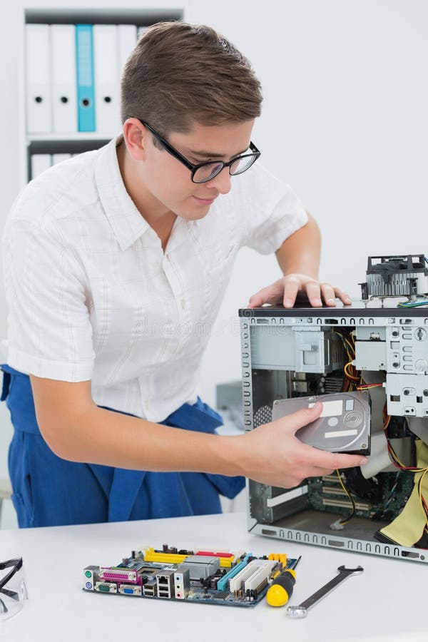 Young Technician Working on Broken Computer Stock Image - Image of ...