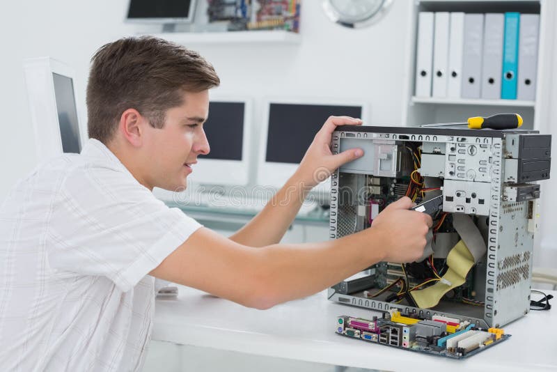 Young Technician Working on Broken Computer Stock Image - Image of ...