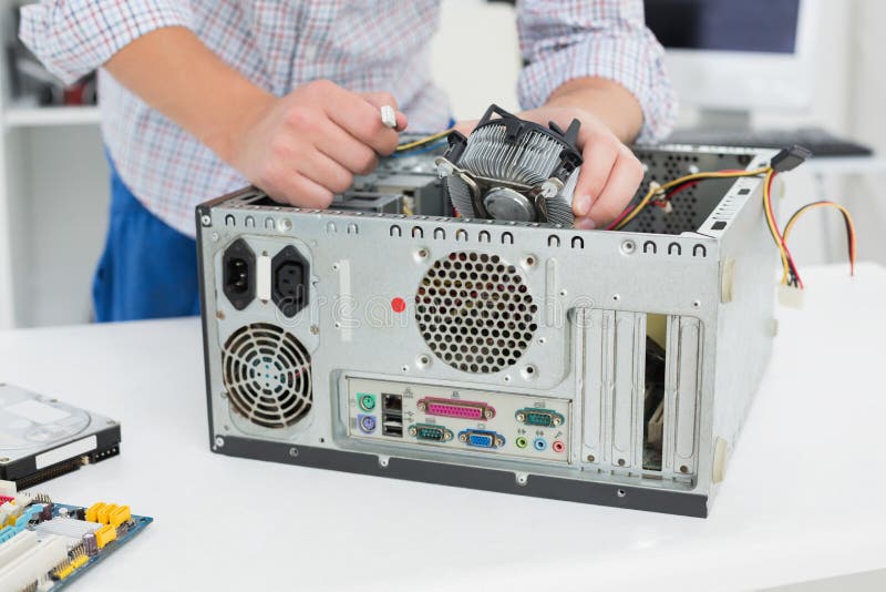 Young Technician Working on Broken Computer Stock Image - Image of ...