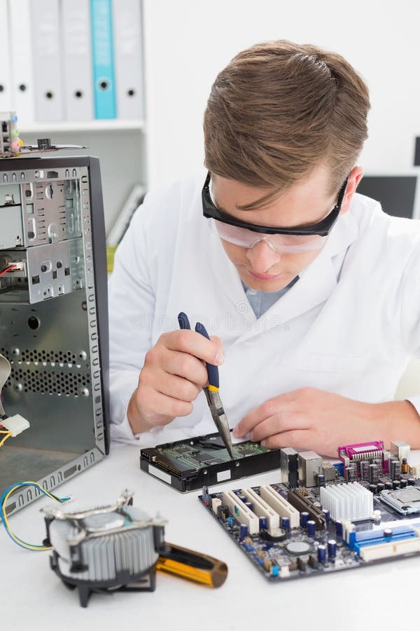 Young Technician Working on Broken Computer Stock Image - Image of view ...