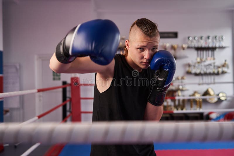 Young boxer shadow boxing stock photo. Image of martial - 321420806