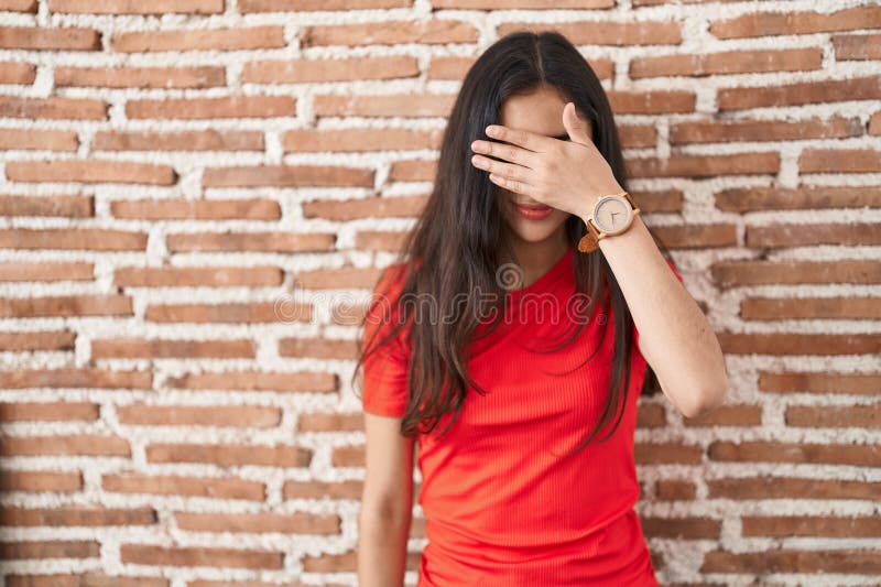 Young Teenager Girl Studying Using Computer Laptop Doing Ok Sign with ... Young Teenager Girl Studying Using Computer Laptop Doing Ok Sign with ...