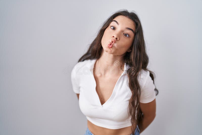 Young Teenager Girl Studying Using Computer Laptop Doing Ok Sign with ... Young Teenager Girl Studying Using Computer Laptop Doing Ok Sign with ...