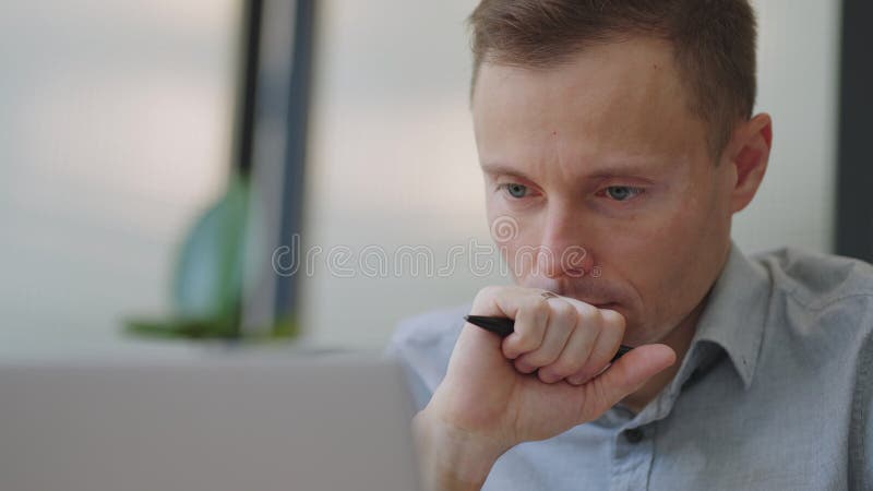 Thoughtful 30s Man Thinking of Problem Solution Working on Laptop ...
