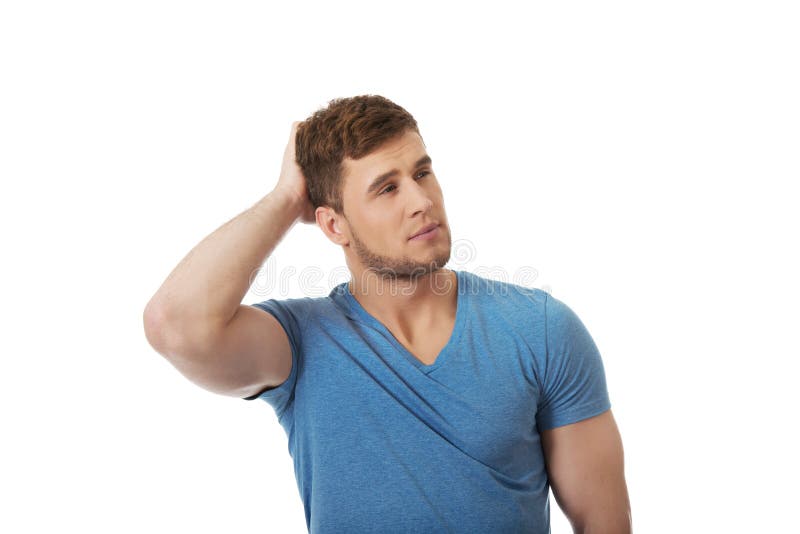 Young Thoughtful Man with Hand Behind Head. Stock Image - Image of ...