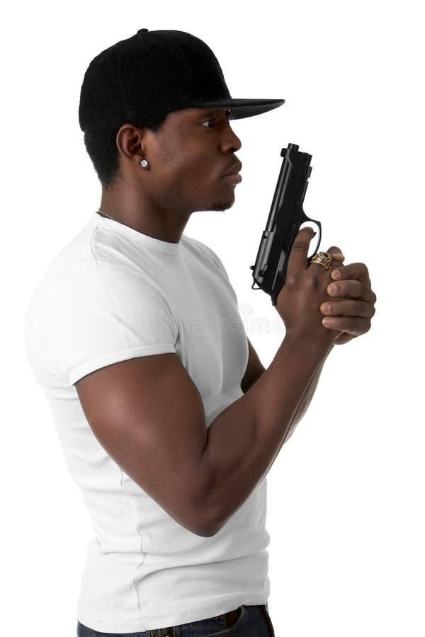 Young thug with a gun stock photo. Image of tshirt, ethnicity - 28677404
