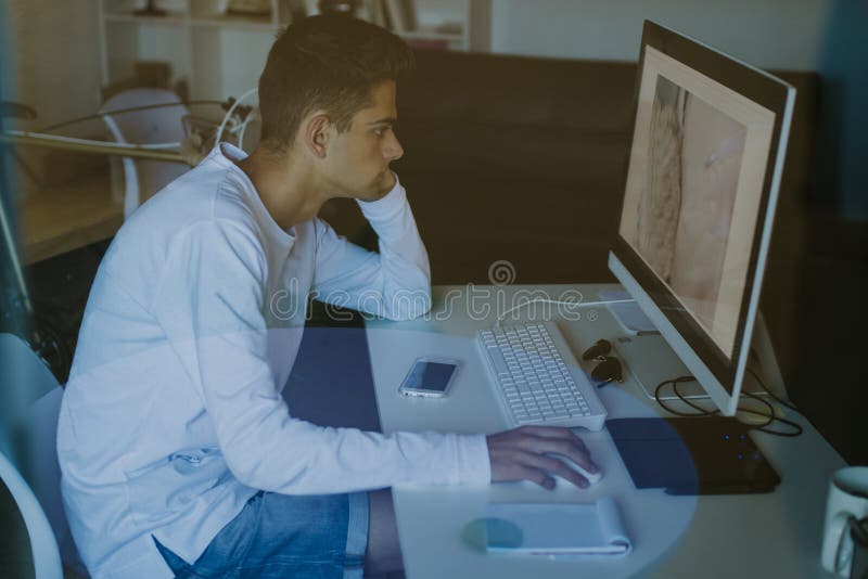 Young Man with Computer at Home Stock Image - Image of exams, graphic ...
