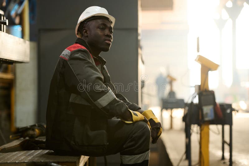 Young Tired African American Workman Resting at Break after Work Stock ...