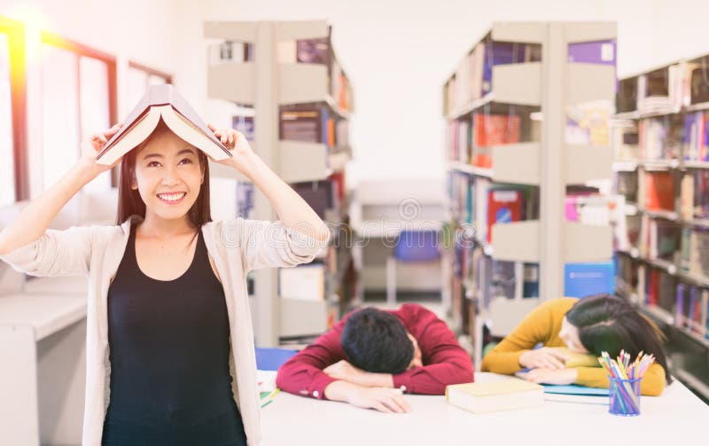 Students rest in library stock image. Image of students - 105986129