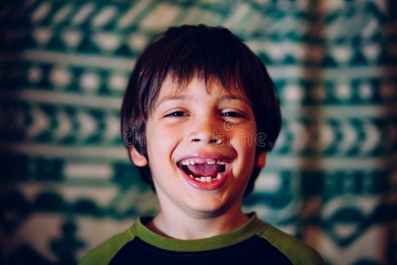 Young Toothless Boy Smiling Stock Photo - Image of green, toothless ...