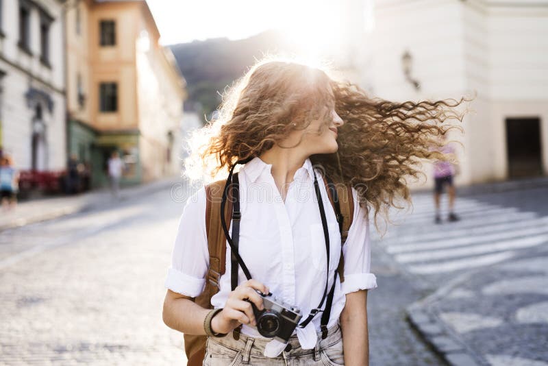 Young Tourist with Camera in the Old Town. Stock Image - Image of hair ...