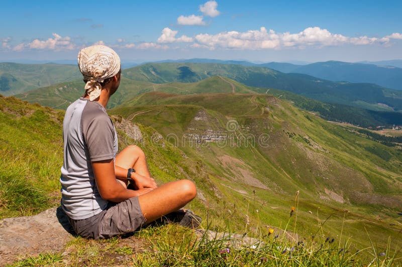 Young Tourist Resting on Top Overlooking the Valley Stock Photo - Image ...
