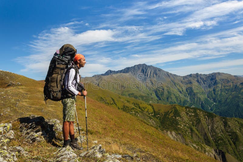 Young Tourist Resting on Top Overlooking the Valley Stock Photo - Image ...