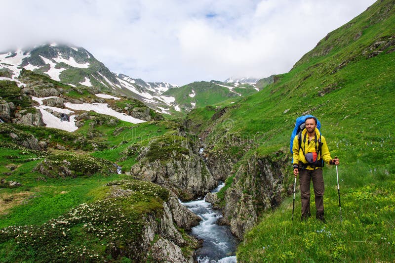 Young Tourist Resting on Top Overlooking the Valley Stock Photo - Image ...
