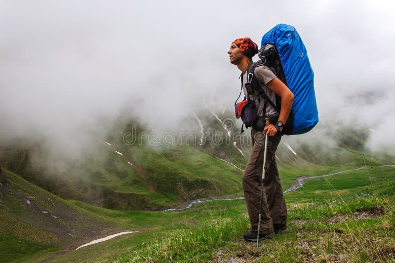 Young Tourist Resting on Top Overlooking the Valley Stock Image - Image ...