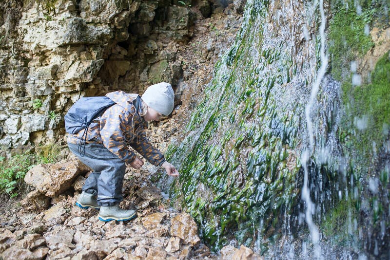 Young tourist at stream stock photo. Image of childhood - 80572856
