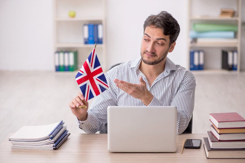 Young Male Translator Sitting in the Office Stock Image - Image of ...
