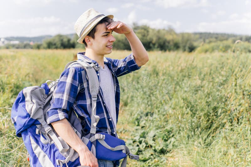 Young Traveler Guy Hiking with Backpack in the Nature Stock Image ...