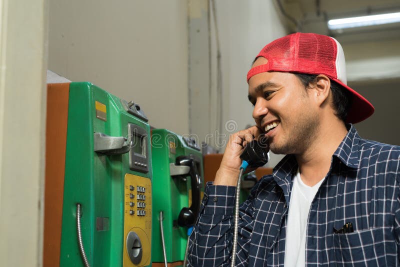 Man Using Public Payphone Stock Photos - Free & Royalty-Free Stock ...