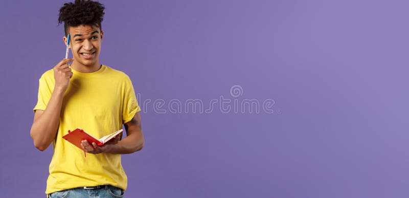 Young Troubled Male Student Studying, Doing Homework, Scratch Head ...