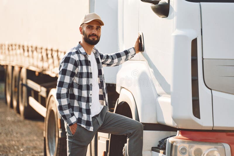 Young Truck Driver is with His Vehicle at Daytime Stock Photo - Image ...