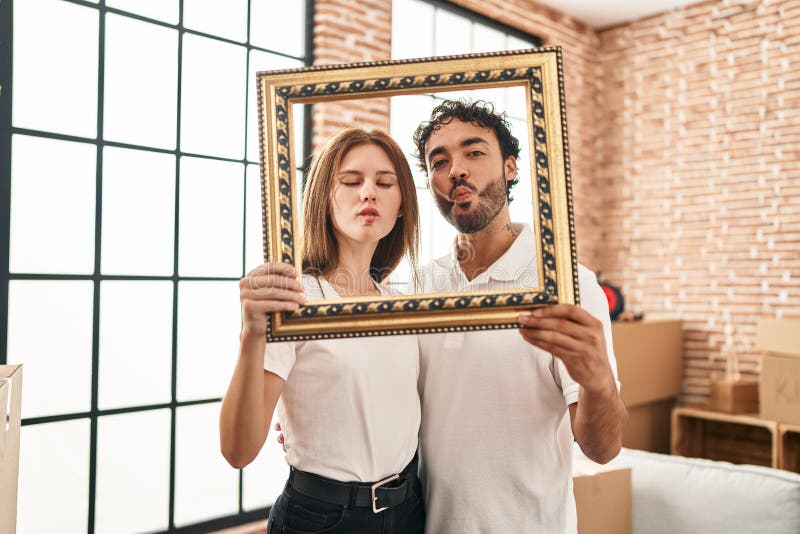 Young Two People Holding Empty Frame Together Making Fish Face with ...