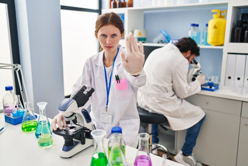 Young Two People Working at Scientist Laboratory with Open Hand Doing ...