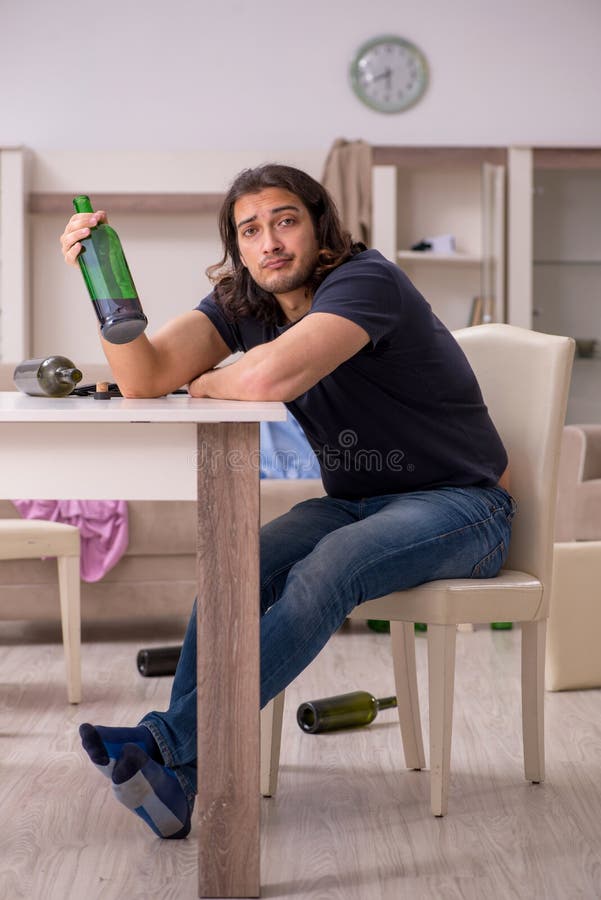 Young Unemployed Man Drinking Alcohol at Home Stock Photo - Image of ...