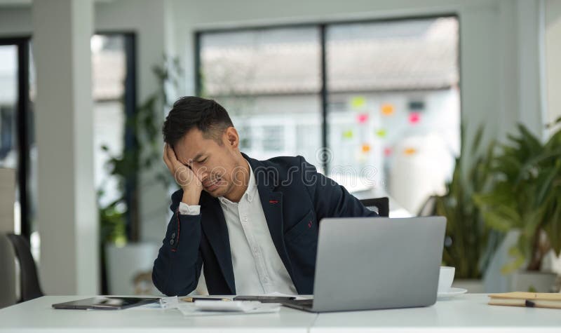 Young Unhappy Man Office Worker Feeling Bored at Work, Looking at ...
