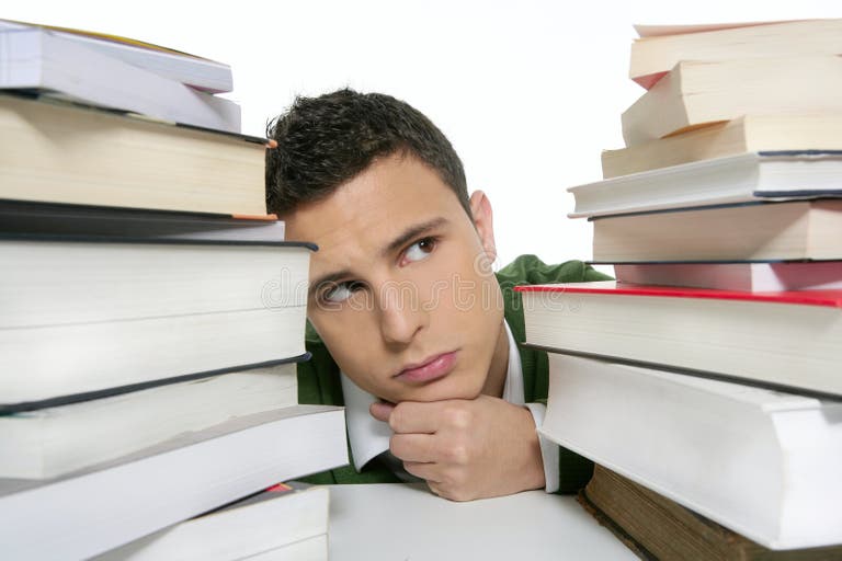 Young Unhappy Student with Stacked Books Stock Photo - Image of paper ...