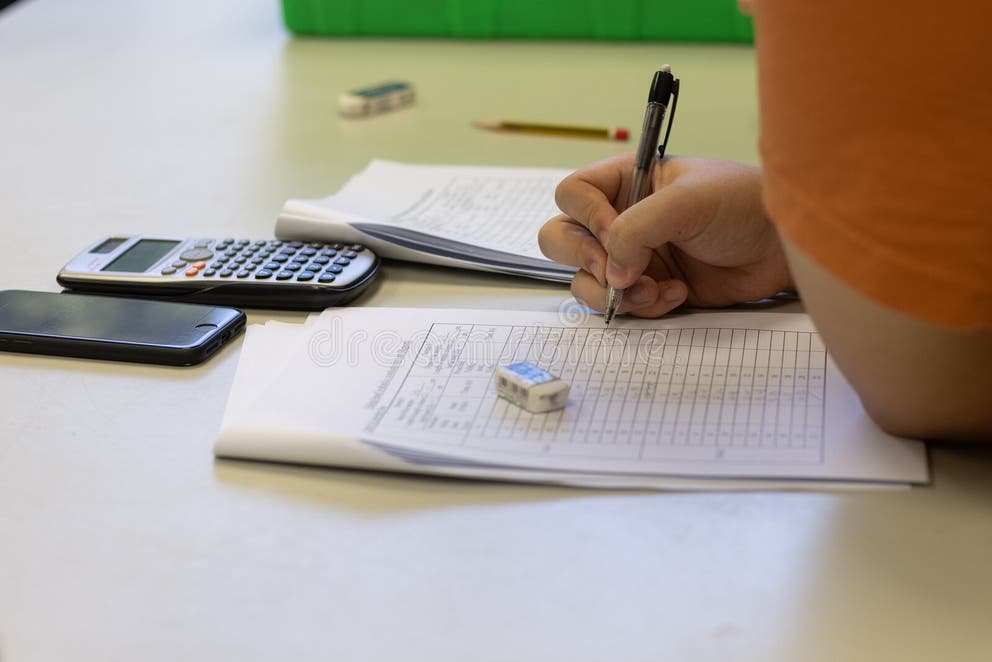 Young University Students or Business People Note and Analyze Data ...