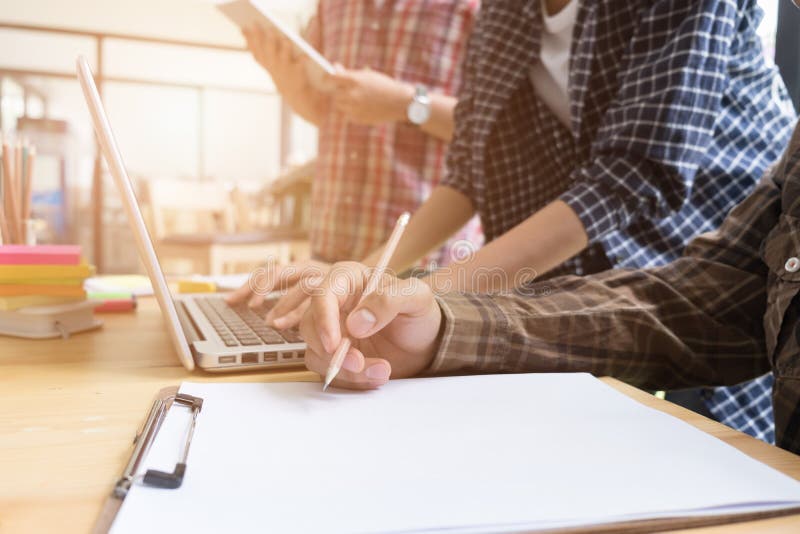 Young University Students Studying with Computer and Tablet in C Stock ...