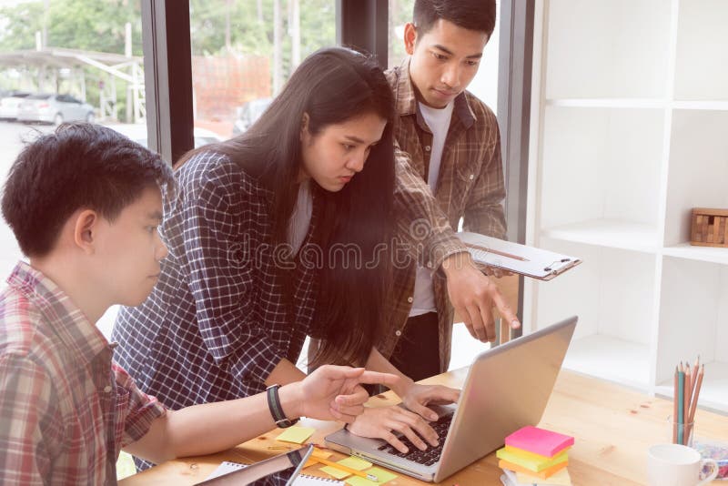 Young University Students Studying with Computer and Tablet in C Stock ...