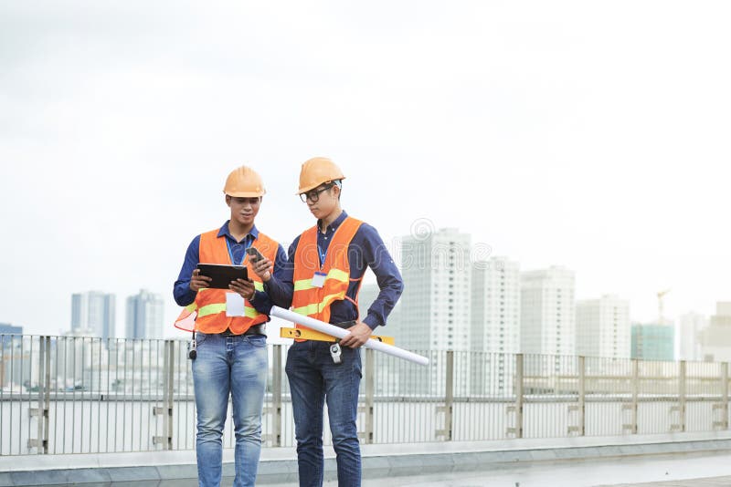 Talking civil engineers stock photo. Image of construction - 124453618