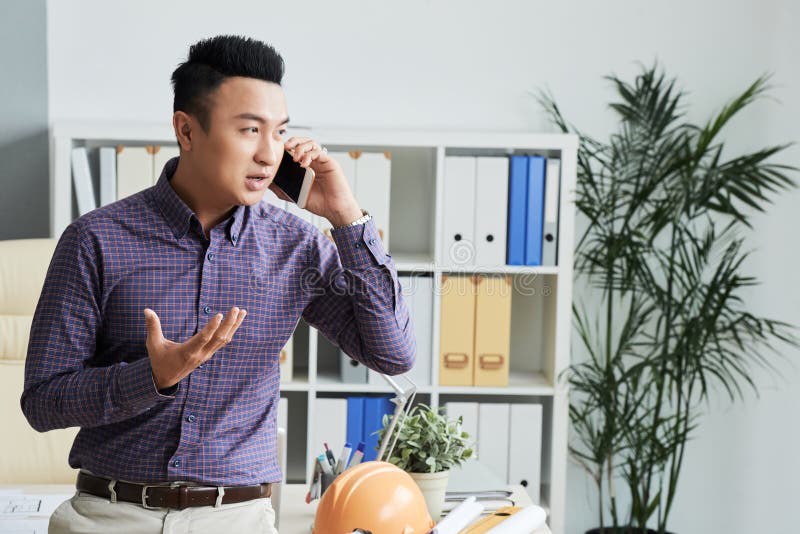 Consulting Client on the Phone Stock Photo - Image of engineer ...