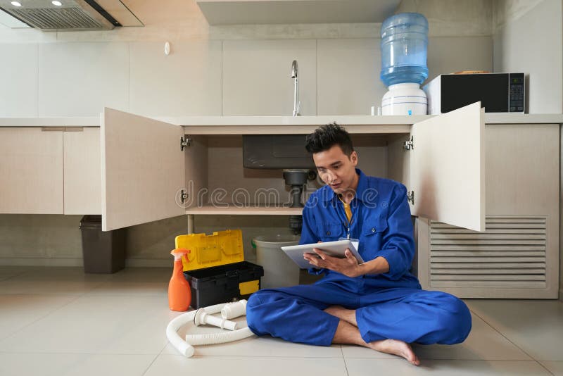 Plumber Checking Tablet Computer Stock Image - Image of pipe, worker ...