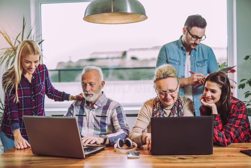 Volunteers Help Senior People on the Computer Stock Photo - Image of ...