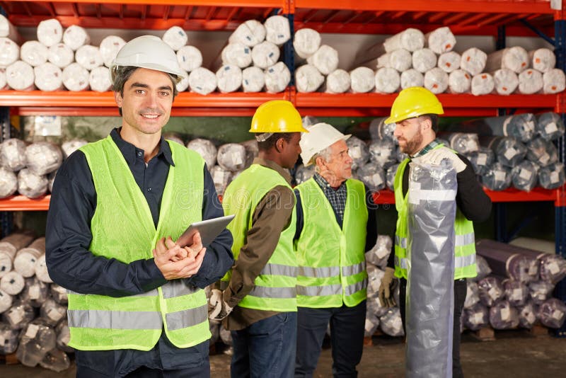 Young Warehouse Worker with Tablet Computer Stock Photo - Image of ...