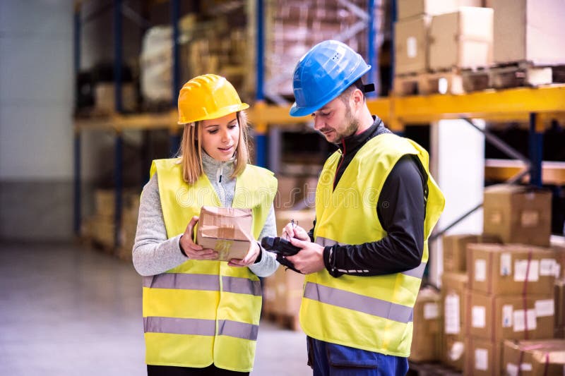 Workers in Warehouse Preparing Goods for Dispatch Stock Photo - Image ...