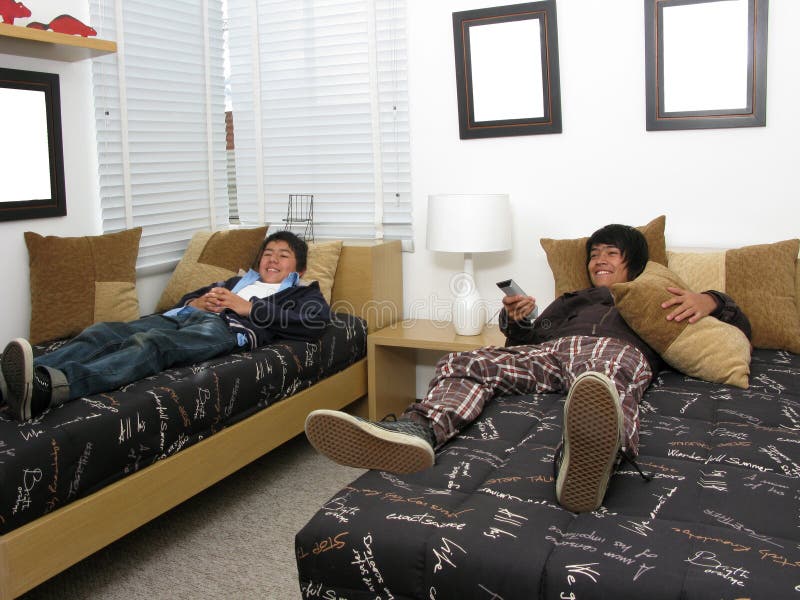 Young watching TV al home stock photo. Image of chanels - 12846300